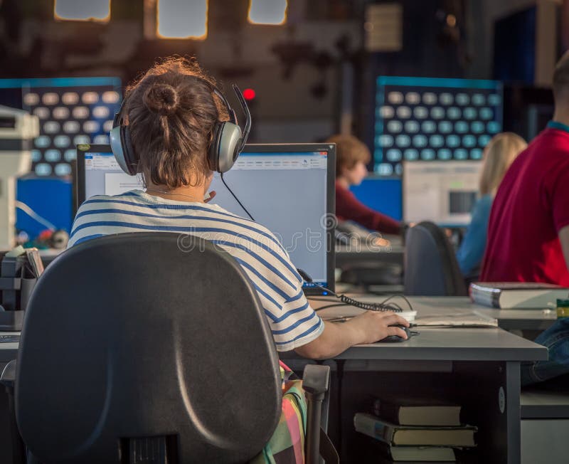 A Journalist Working on a Computer in Newsroom Editorial Stock Photo ...