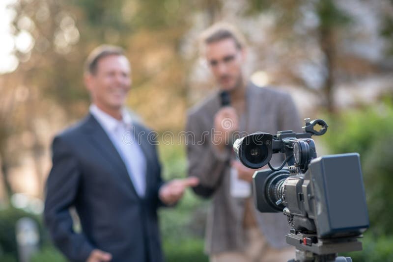 Close-up of Camera Recording Interviewing Process Outside Stock Photo ...
