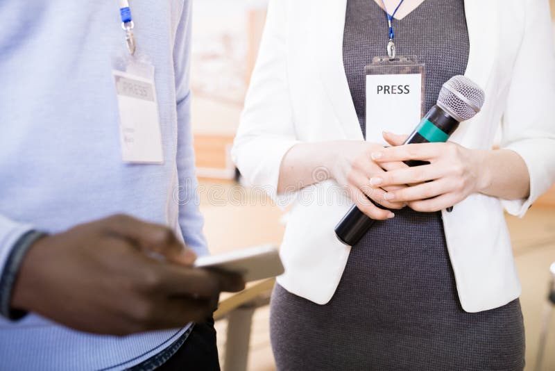 Journalists with ID Tags stock image. Image of reporter - 115546491