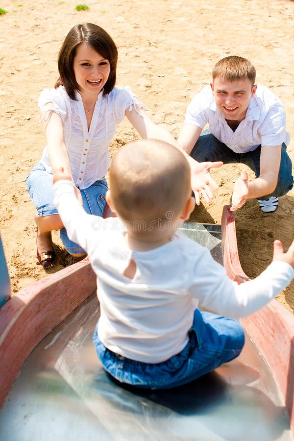 Parents Catching Their Son Stock Photos - Free & Royalty-Free Stock ...