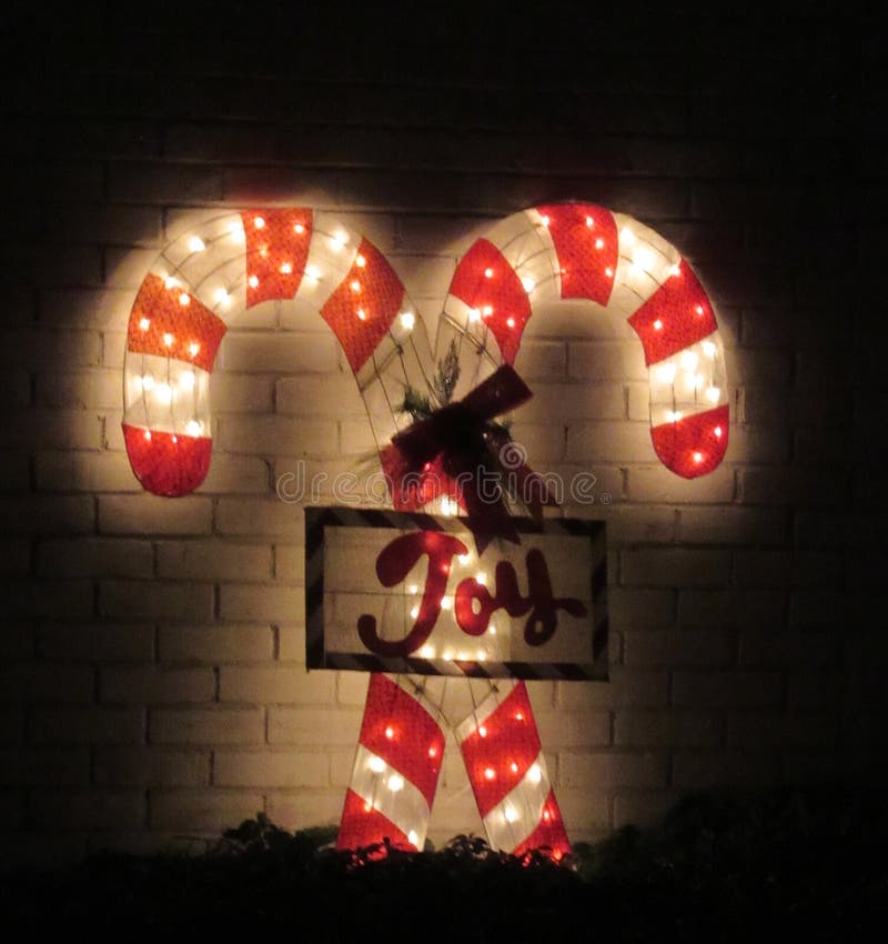 Joy candy canes stock image. Image of light, pink, lighting - 263364461