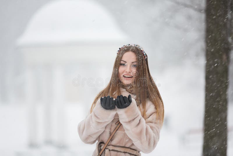 The joy of falling snow stock image. Image of black, white - 65822357