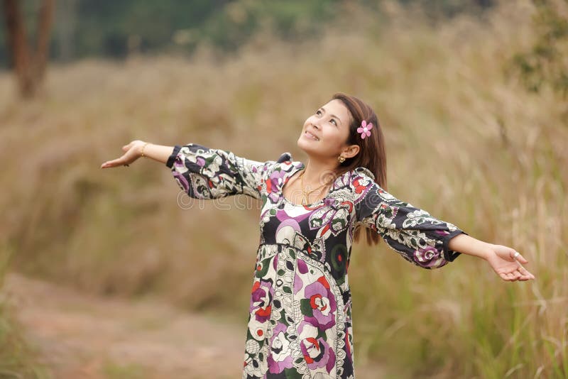 Joy in nature stock image. Image of dress, asian, beautiful - 23862015