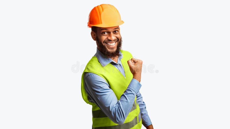 Joyful Black Construction Worker Gesturing Yes on White Background ...