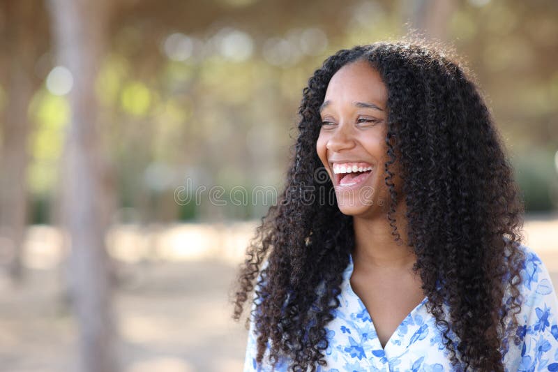 Joyful Black Woman Laughing Loud in a Park Stock Image - Image of happy ...
