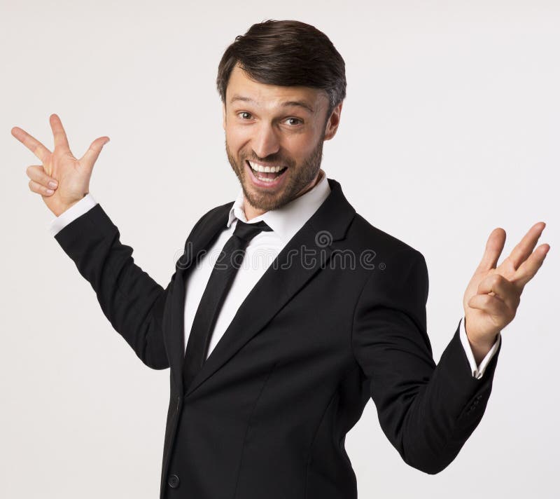 Joyful Business Guy Shouting Standing and Gesturing, Studio Shot Stock ...
