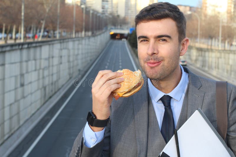 Joyful Businessman Devouring a Hamburger Stock Image - Image of german ...
