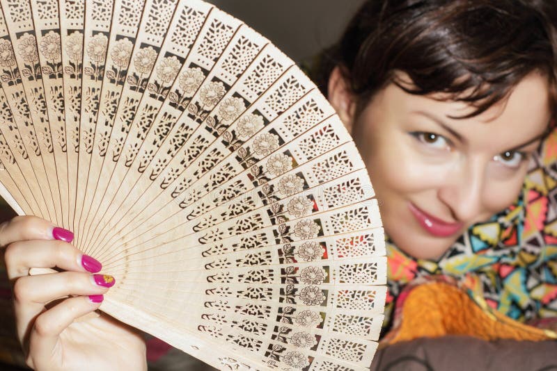 Joyful Caucasian Woman with a Fan Stock Image - Image of colorful ...