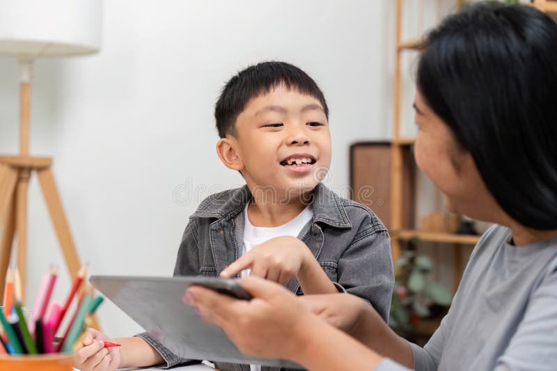 Interactive Learning and Engagement. a Child Happily Interacting with a ...