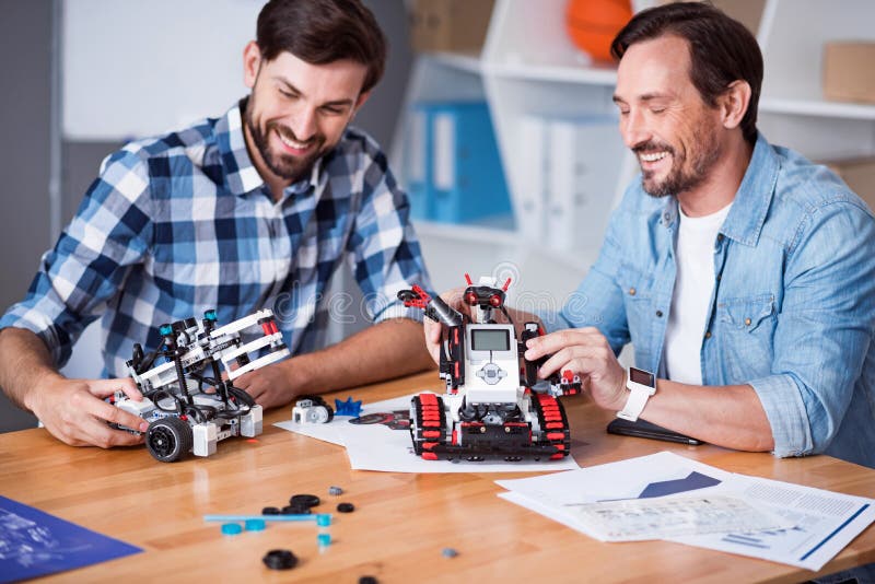 Joyful Colleagues Testing Robots Stock Image - Image of caucasian ...