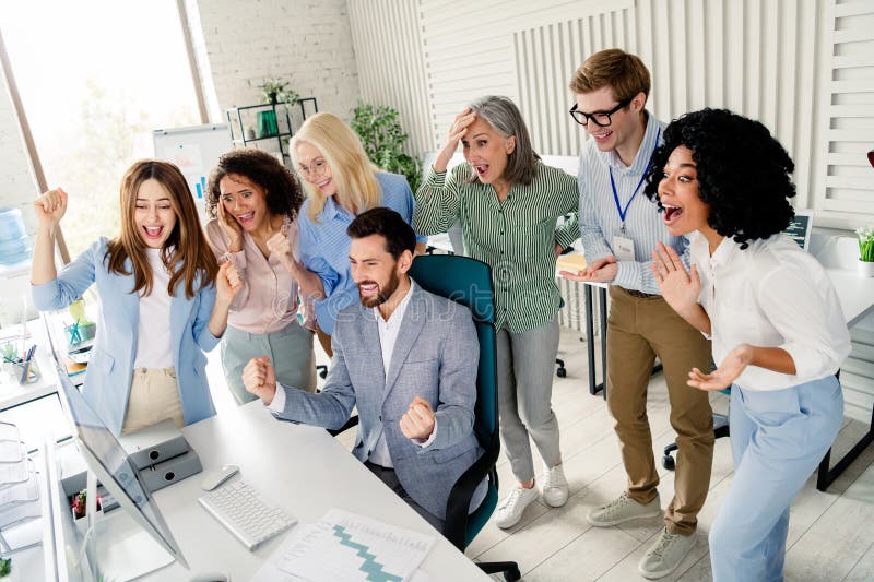 Diverse Cheerful Office Team Celebrating Success Together in a ...