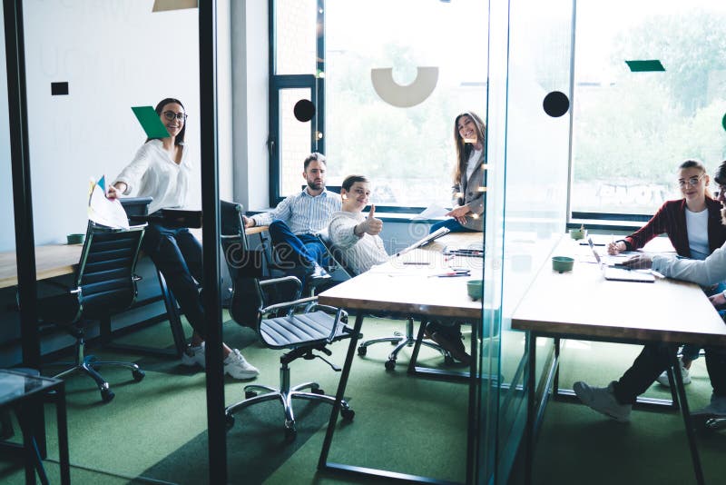 Joyful Coworkers at Table in Modern Office Stock Photo - Image of ...