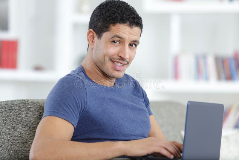 Joyful Cute Guy Using Laptop Stock Image - Image of occupation, alone ...