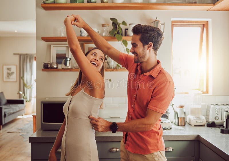 Joyful, Dancing and Loving Couple Bonding and Having Fun in the Kitchen ...