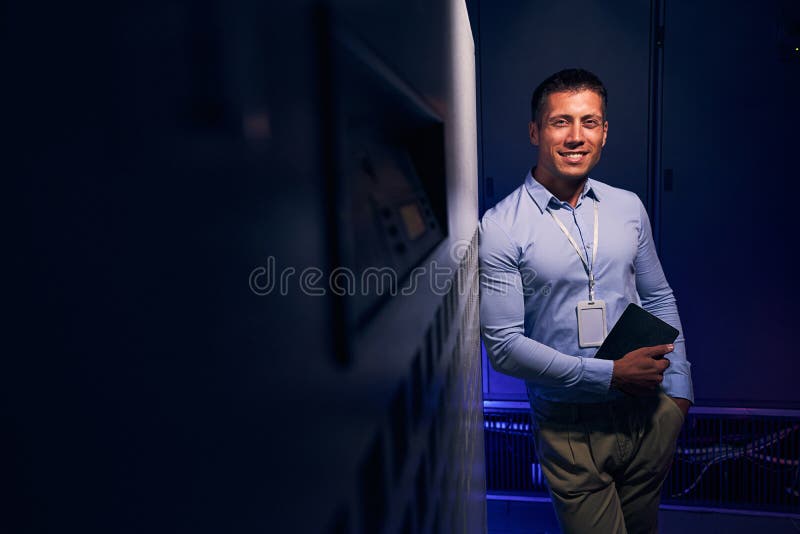 Joyful Data Center Employee Posing for Camera in Workplace Stock Image ...