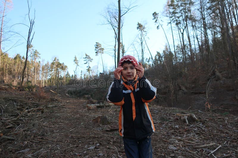 Joyful Expression and Sign Language. the Boy Stands Facing the Camera ...