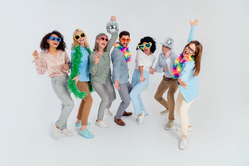 Group of Diverse Colleagues Celebrating Teamwork with Fun Props Over a ...