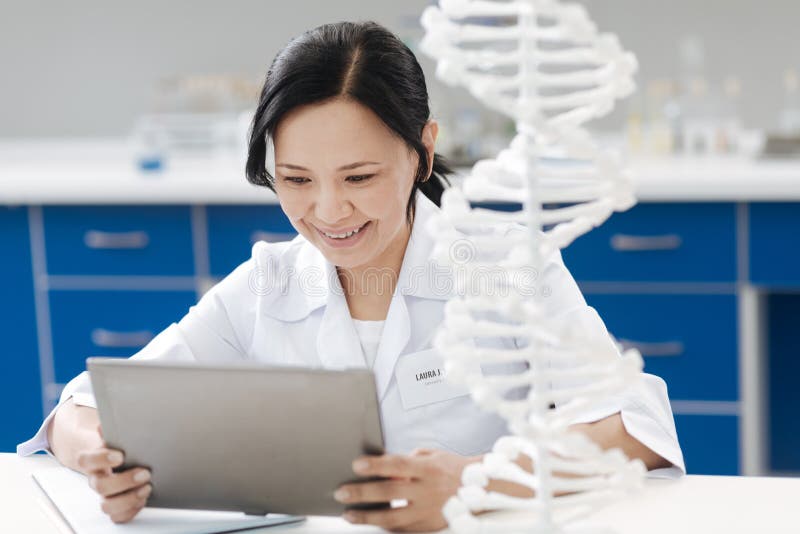 Joyful Genetic Scientist Using a Tablet Stock Image - Image of chemical ...