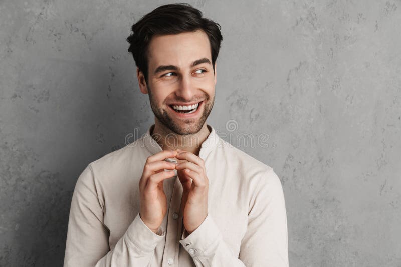 Joyful Handsome Unshaven Guy Smiling and Looking Aside Stock Image ...