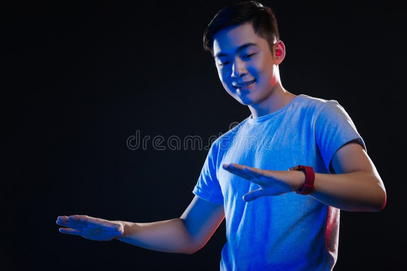 Joyful Happy Man Looking at His Hands Stock Image - Image of male ...