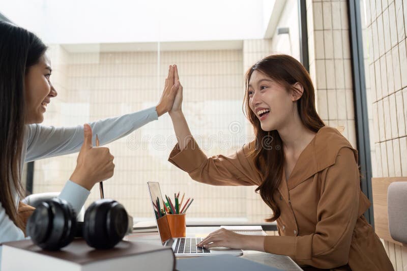 Joyful Learning and Collaboration. Two Students Share a High Five ...