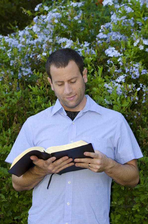 Joyful Man Reading the Bible Outside. Stock Photo - Image of shirt ...