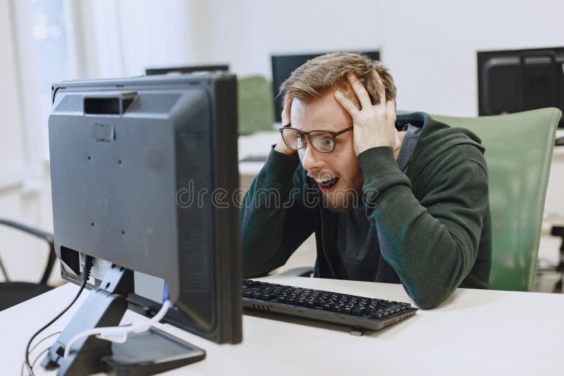 Joyful Man Sitting at the Computer. Stock Photo - Image of analyzing ...