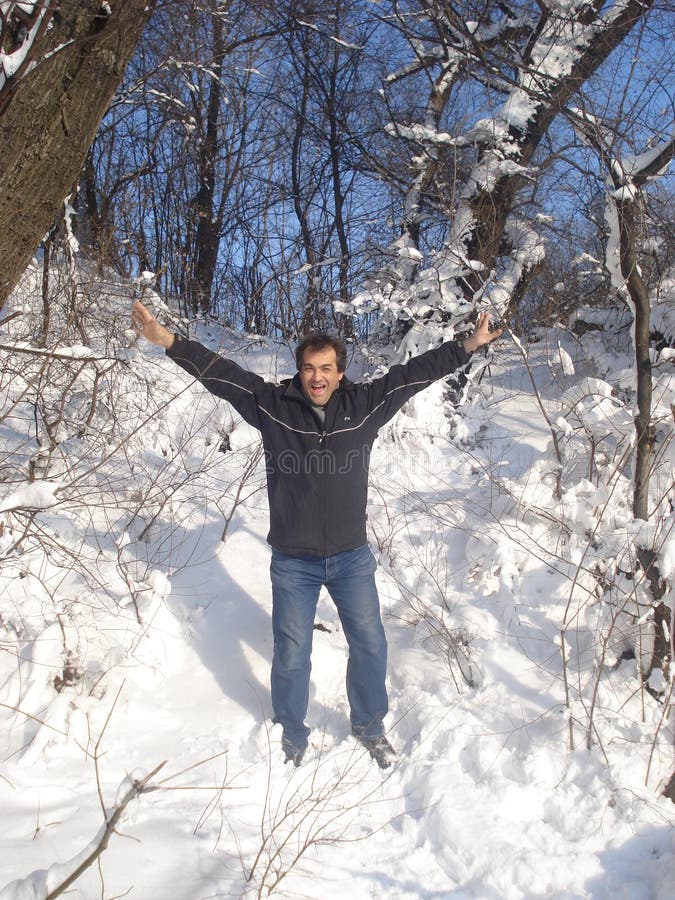Joyful Man in Winter Scenery Stock Photo - Image of middle, sunshine ...