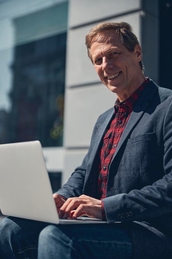 Joyful Man Working on Modern Notebook Outdoors Stock Photo - Image of ...