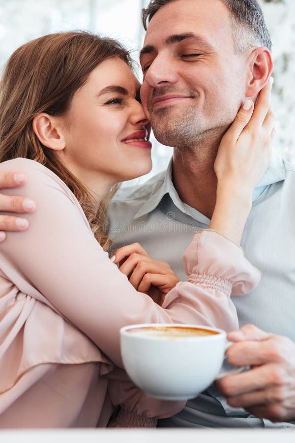 Joyful Married Couple Hugging In Kitchen Happy Man Wearing Home