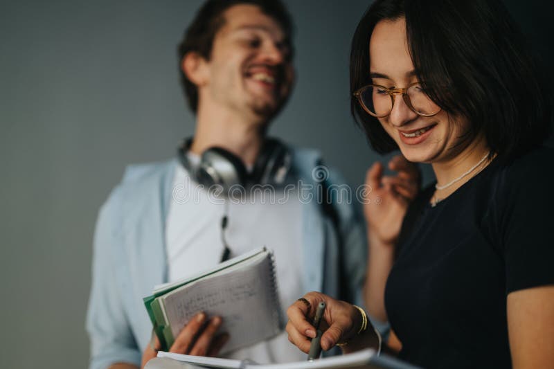 Smiling Students Engaging in Outdoor Academic Discussion Stock Image ...