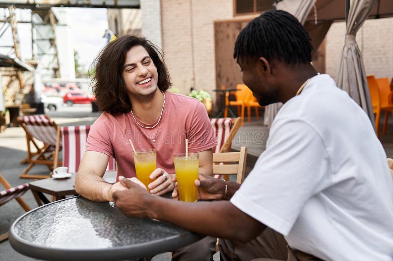 Joyful Moments Shared Over Refreshing Drinks Stock Photo - Image of ...