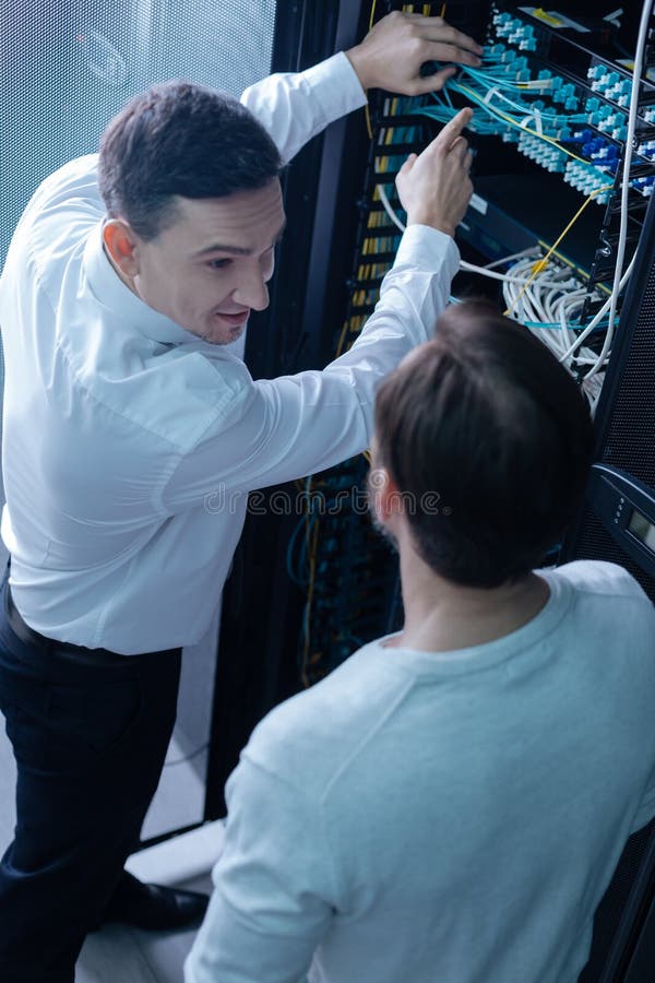 Joyful Nice Man Looking at His Colleague Stock Photo - Image of modern ...