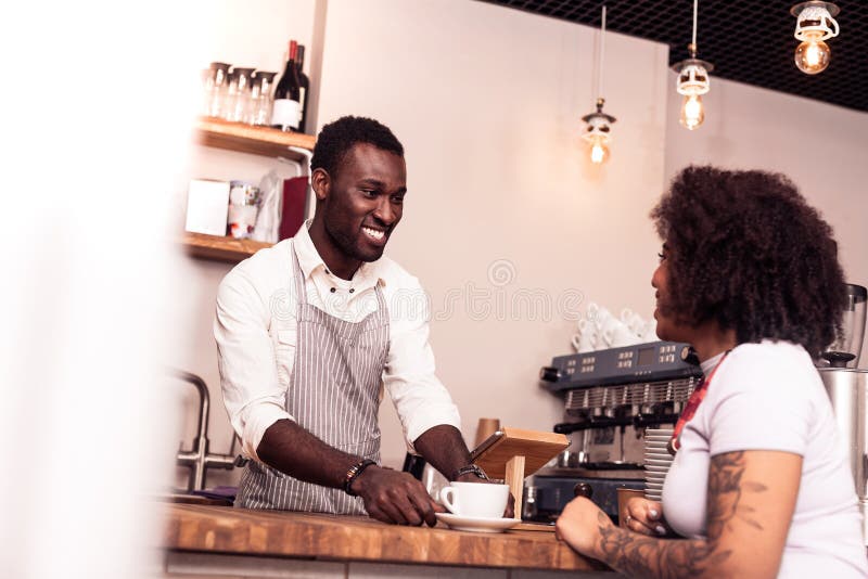 Joyful Nice Man Serving Coffee To the Customer Stock Image - Image of ...