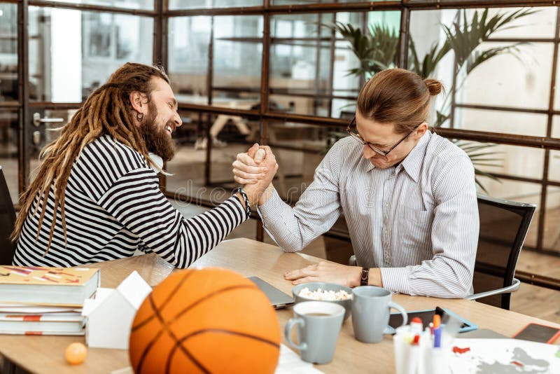 Joyful Nice Men Deciding Who is Stronger Stock Image - Image of ...