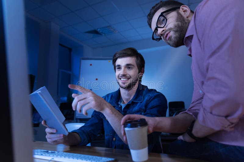Joyful Positive Man Pointing at the Computer Screen Stock Photo - Image ...