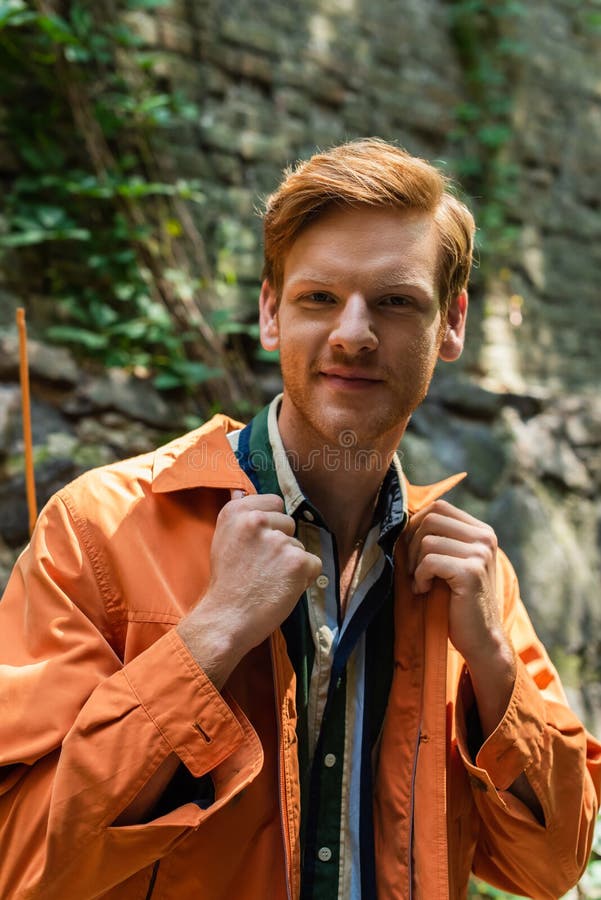 Joyful Redhead Man in Orange Jacket Stock Photo - Image of nature ...