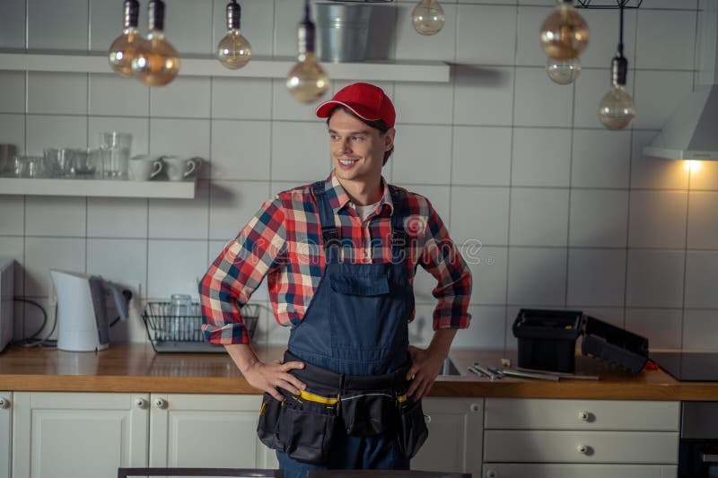 Joyful Repair Technician in a Client Apartment Ready for Work Stock ...
