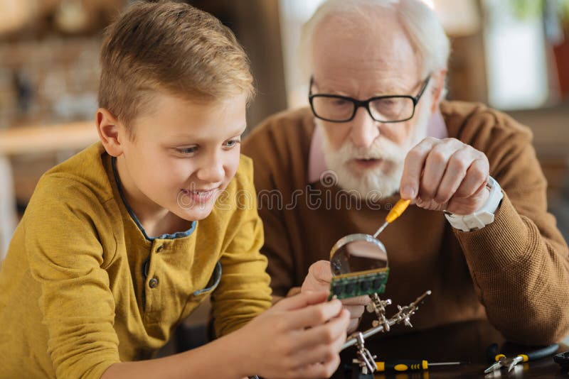 Joyful Smart Boy Looking at the Microscheme Stock Photo - Image of ...