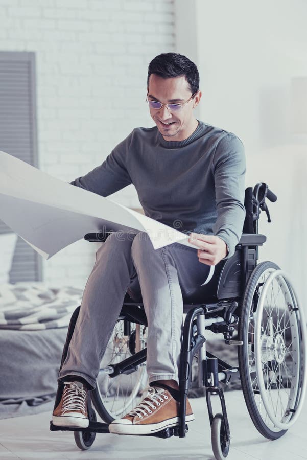 Joyful Smart Engineer Looking at the Blueprint Stock Image - Image of ...
