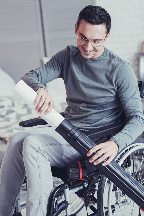 Joyful Smart Man Taking Out a Blueprint Stock Photo - Image of industry ...