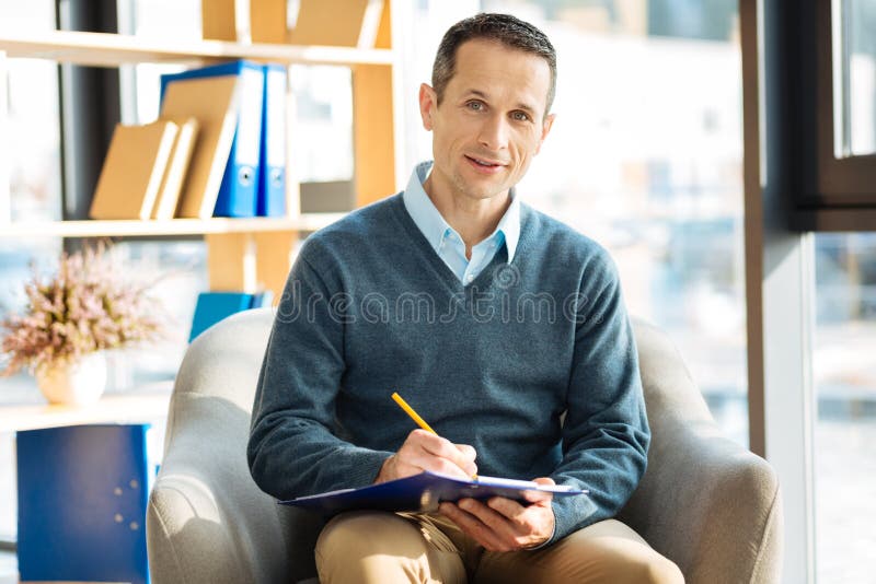 Joyful Smart Man Writing in His Notes Stock Photo - Image of profession ...