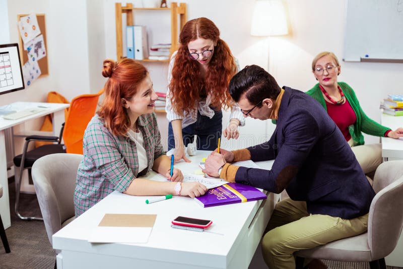 Joyful Smart Young People Doing Their Tasks Stock Image - Image of ...
