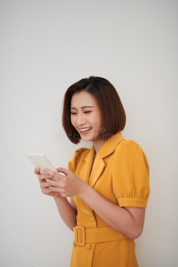 Joyful Smiling Girl Texting Message or Enjoying New App Stock Image ...