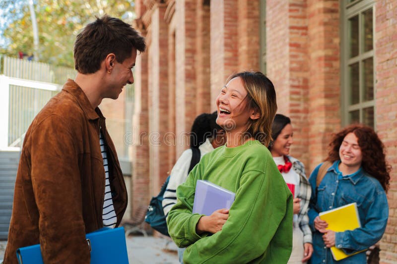 Joyful Students Engaging in Lively Conversation while Sharing Laughter ...