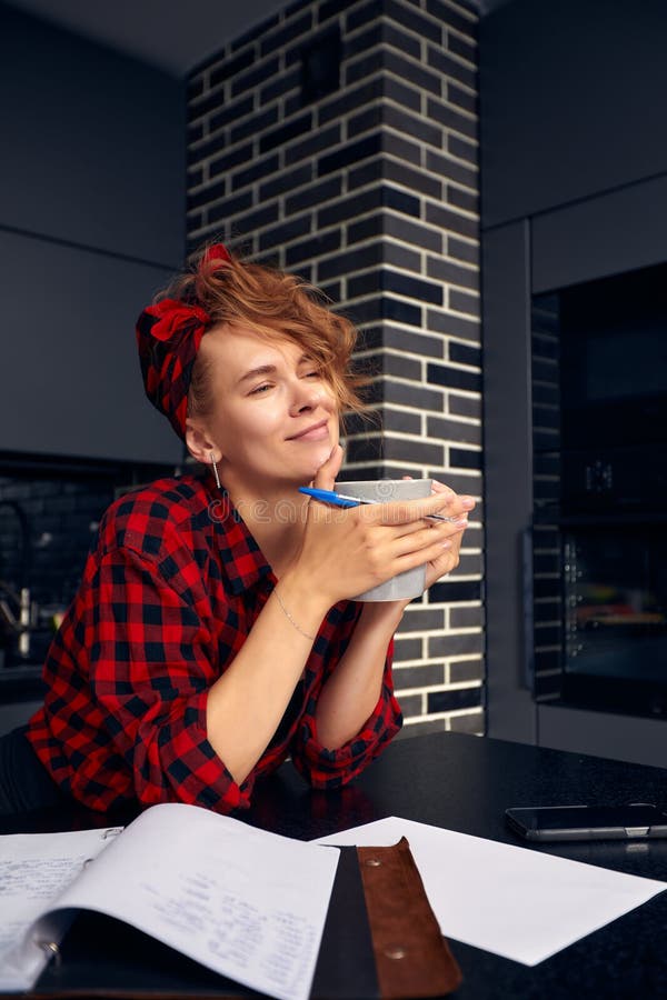 Joyful Young Female Working from Home, Doing Paperwork, Having Coffee ...