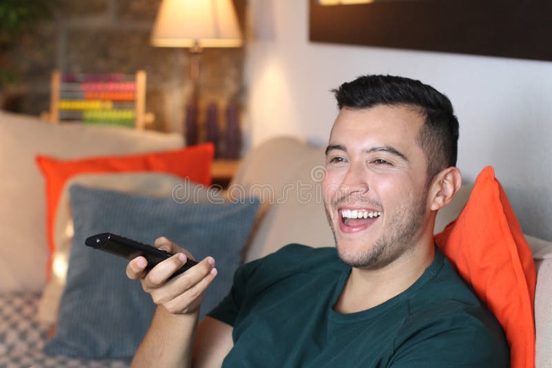 Joyful Young Guy Watching Television Stock Image - Image of apartment ...