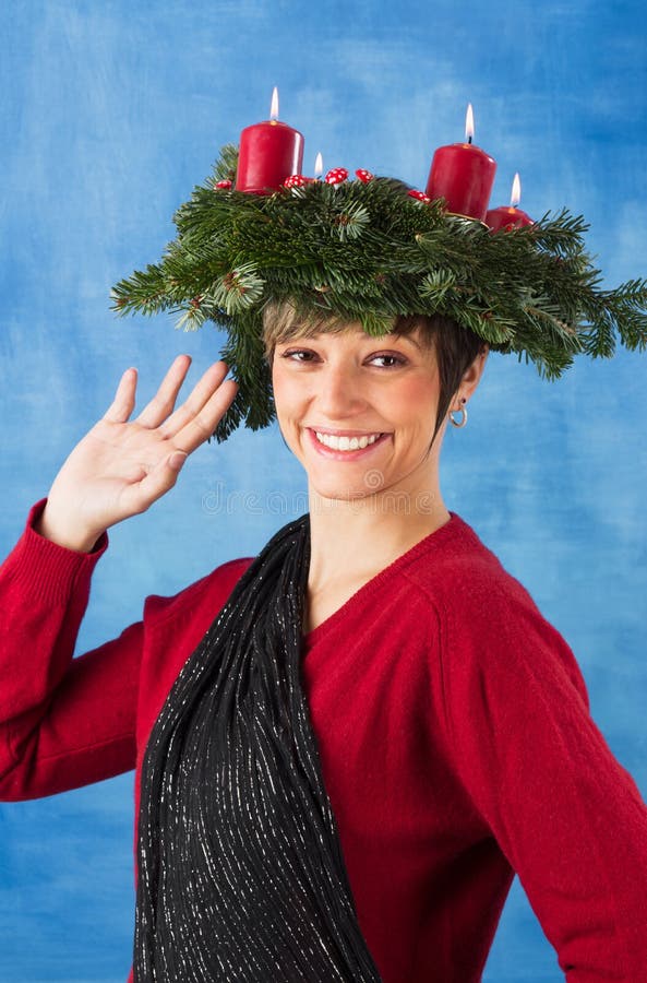 Joyfully Waving Woman with Advent Wreath Stock Photo - Image of hand ...