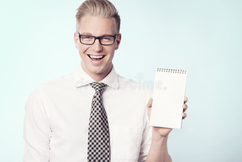 Joyous Businessman Presenting Blank Notepad. Stock Photo - Image of ...