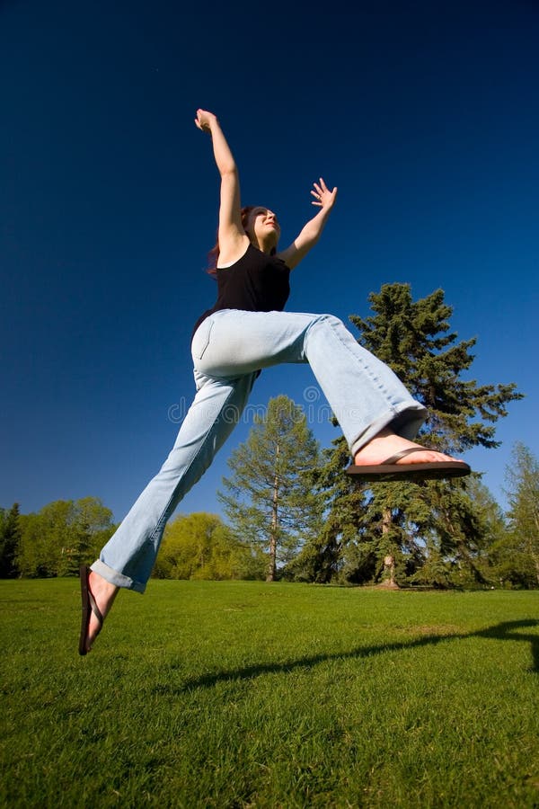 Joyous Jump stock photo. Image of success, sunshine, leap - 775240